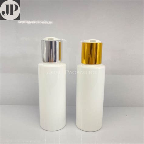 Jual BOTOL PRESSTOP 100ML PUTIH TUTUP GOLD SILVER DISCTOP PET RF 100 ML