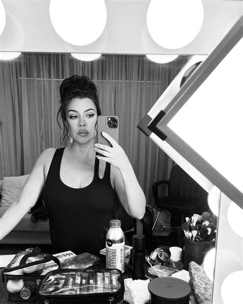 Kourtney Kardashian Shows Off Her Huge Baby Bump As She Goes Topless