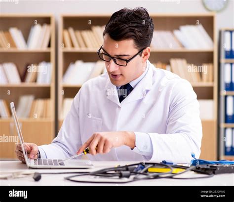 The It Technician Repairing Broken Laptop Notebook Computer Stock Photo