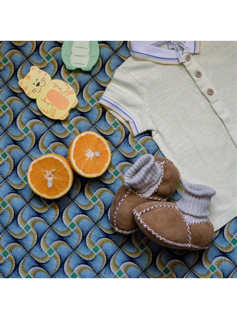 Chaussons bébé en peau d Agneau double face avec la tige élastiquée