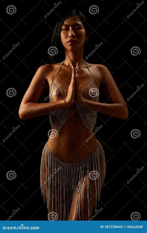 Naked Asian Girl In Transparent Dress With Rhinestones On Threads With