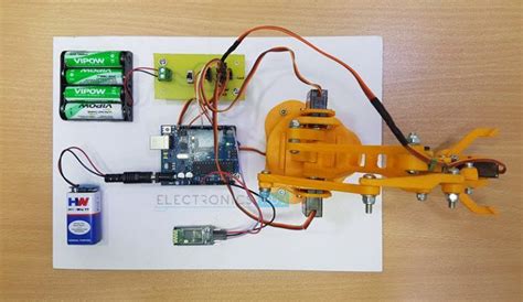 diy arduino and bluetooth controlled robotic arm project with circuit diagram and output arduino