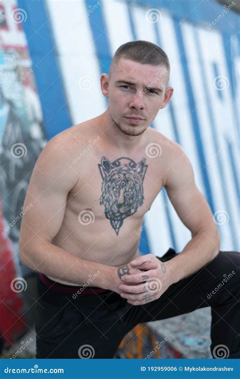 Male Bully With A Naked Torso By Day Stock Photo Image Of Brutal