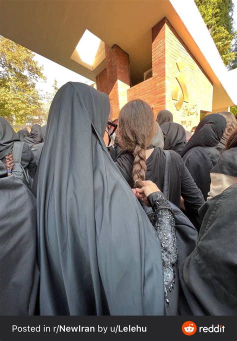 An Iranian Girl With Hijab Braids Her Friends Hair During Protests Against Mandatory Hijab
