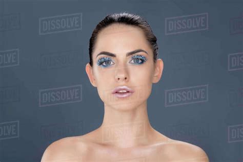 Portrait Of Beautiful Naked Woman With Winter Makeup With Glitter