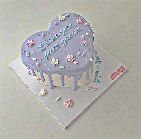 A Heart Shaped Cake On Top Of A Table