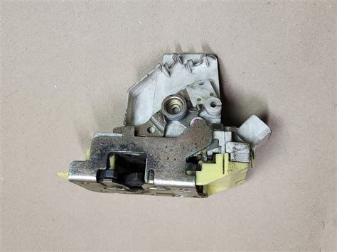 ZAMEK DRZWI LEWY TYŁ FORD FOCUS MK1 2 PIN XS41 A26413 BH OE EUROPA XS41