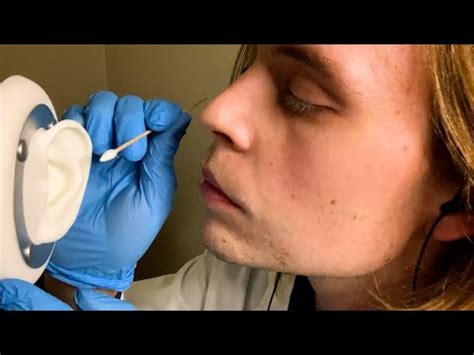 ASMR Detailed Ear Exam Up Close Whispering Ear Cleaning Doctor