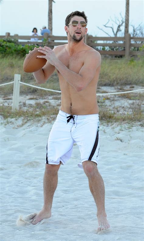 Shirtless Photos Of Michael Phelps On The Beach Popsugar Celebrity