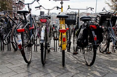 Premium Photo Bicycles Parked On Street In City