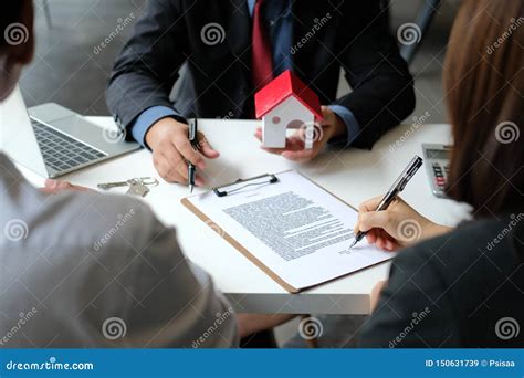 Couple Buying Renting House Signing Mortgage Contract Agreement With