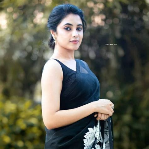 Priyanka Mohan Gorgeous Stills In Black Saree Telugu Swag