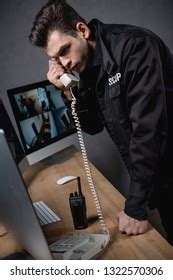 Guard Uniform Talking On Telephone Looking Stock Photo 1322570306