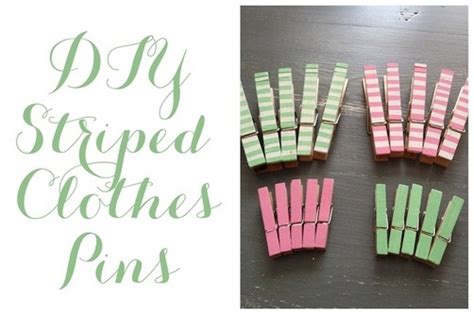 Four Different Colored Clothes Pins Sitting On Top Of A Wooden Table