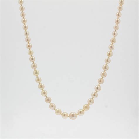 Collier en chute de perles à l orient crème nacré Collier perle
