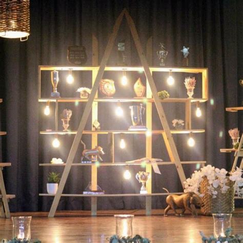 A Frame Bookcase With Naked Bulbs