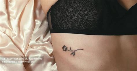Hand Poked Rose Tattoo Located On The Rib