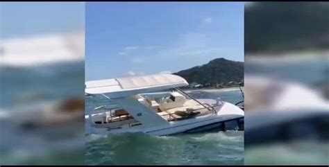 Vídeo Lancha 2 pessoas afunda em praia de São Francisco do Sul
