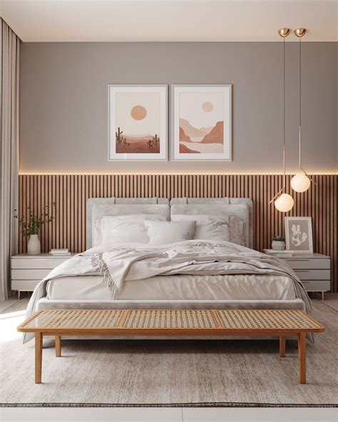 A Large Bed Sitting In A Bedroom Next To Two Pictures On The Wall Above It