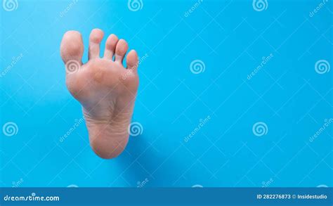 Female Bare Foot On A Blue Background Stock Image Image Of Blue Relax 282276873