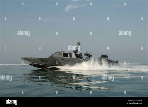 US Navy Naval Special Warfare Combatant Craft Crewmen Operate A Mark V