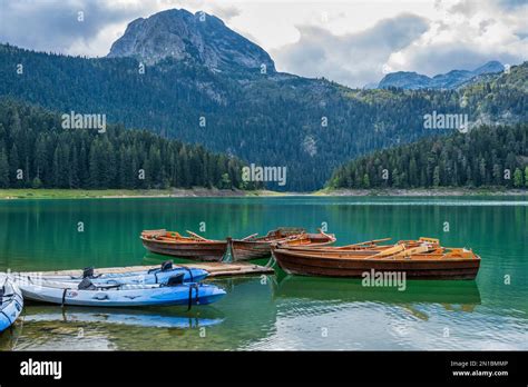 Rowing Boats And Canoes On The Black Lake Crno Jezero With Meded