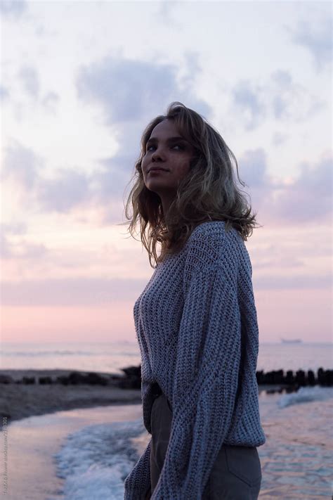 Young Woman Standing At Ocean Del Colaborador De Stocksy Danil Nevsky Stocksy