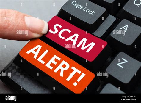 Hand Writing Sign Scam Alert Word For Warning Someone About Scheme Or