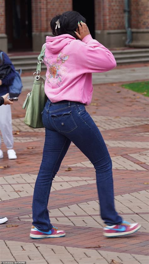 Sasha Obama Braves The Los Angeles Rain As She Heads To Class In A Pink