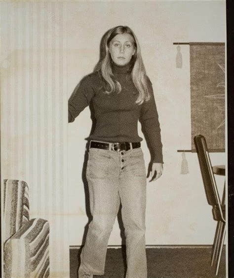 Black And White Photograph Of Woman Standing In Room