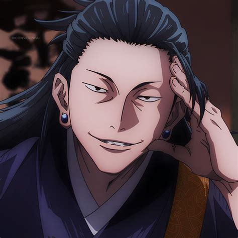 A Man With Long Black Hair And Blue Eyes Is Holding His Hand To His Ear