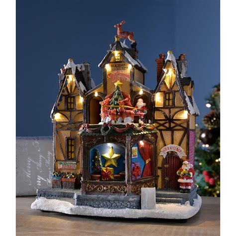 WeRChristmas Pre Lit LED Musical Animated Christmas Shop Scene