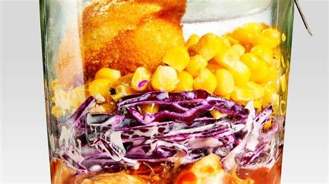 A Glass Jar Filled With Different Types Of Food