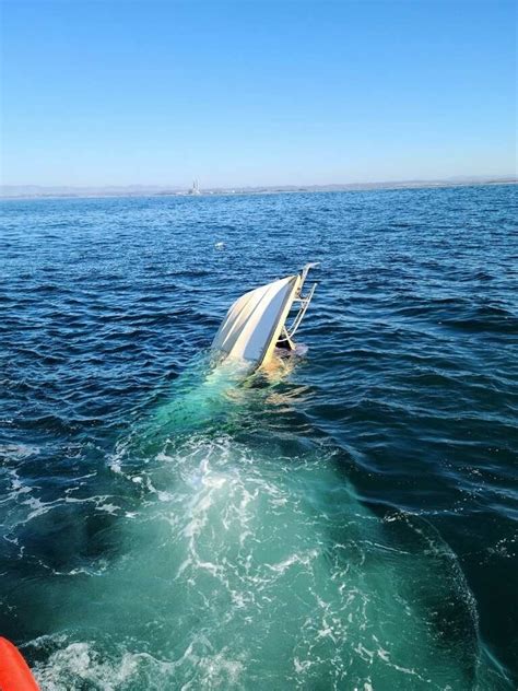 DVIDS Images Coast Guard Rescues 2 People After Vessel Capsizes