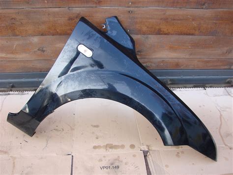 Błotnik prawy przedni Ford Focus II MK2 03 07r 6661871698 oficjalne