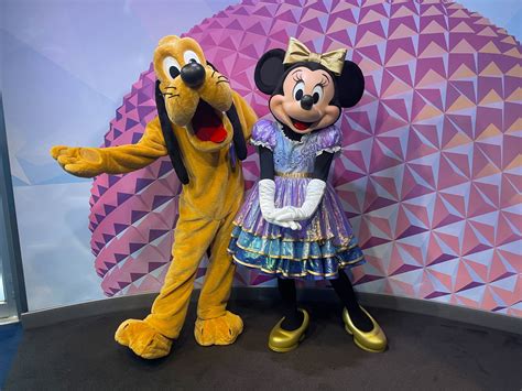Minnie Pluto Mickey And Goofy Appearing In Th Anniversary Outfits