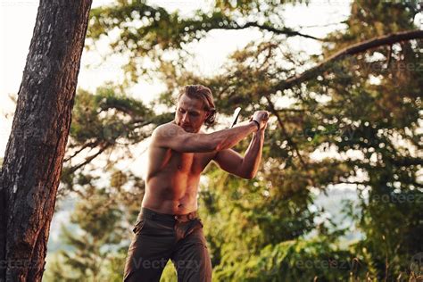 Process Of Cutting The Tree By Using The Axe Handsome Shirtless Man