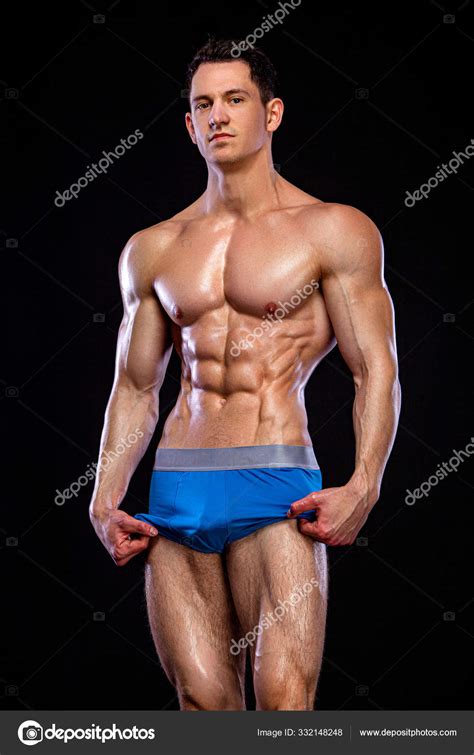 Athlete Bodybuilder Strong And Fit Man Sporty Muscular Guy On Black