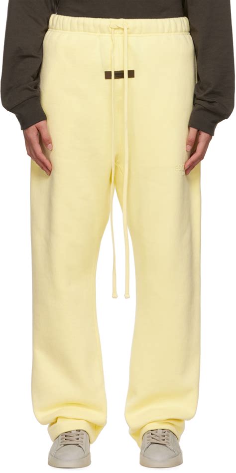 Yellow Relaxed Lounge Pants By Fear Of God Essentials On Sale