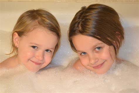 Brother And Sister Showering Together