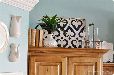 Ways To Decorate Above Kitchen Cabinets Birkley Lane Interiors