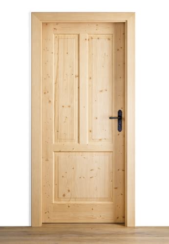 An Open Wooden Door On A White Wall