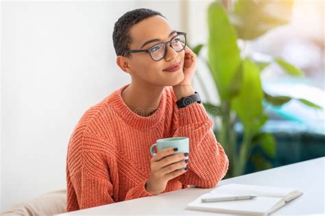 Positive Calm Young Latin Woman In Glasses Enjoy Peace And Free Time Planning Day Stock Image
