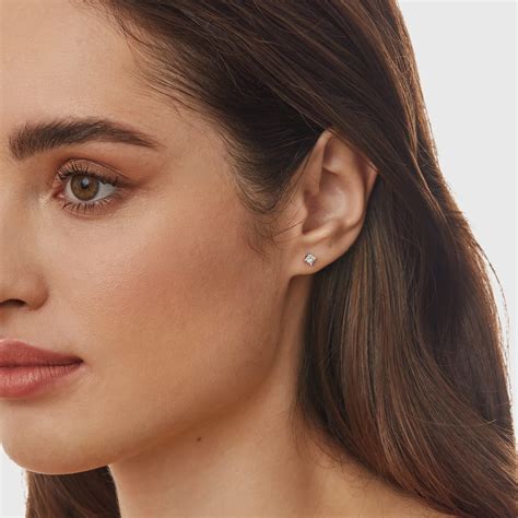 Ohrringe mit Diamanten aus Weißgold KLENOTA