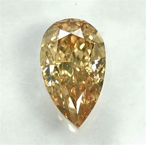 Diamond 0 61 Ct Pear Natural Fancy Light Brownish Catawiki