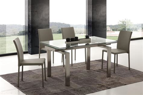Tavolo Allungabile In Vetro E Acciaio Spazzolato IDFdesign