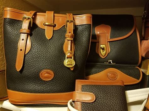 Vintage Dooney All Weather Leather Collection In Navy And British Tan