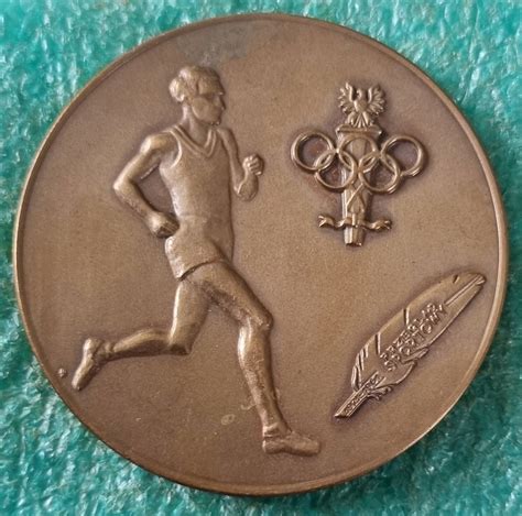 MEDAL POLSKI KOMITET OLIMPIJSKI M S JANUSZ KUSOCIŃSKI 14897642944