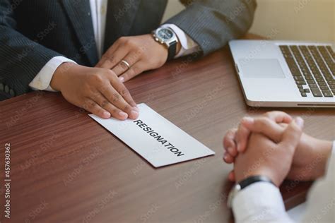 Hand Of Employer Get A Resignation Letter From An Employee Letter Of