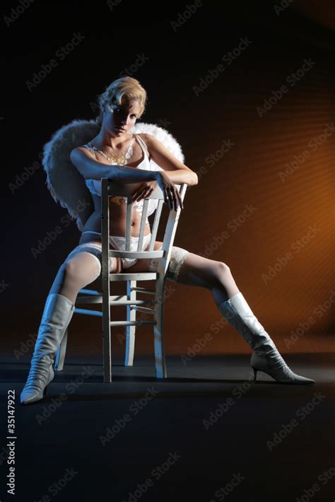 Eine Beinahe Nackte Frau Als Engel In Dessous Stock Photo Adobe Stock